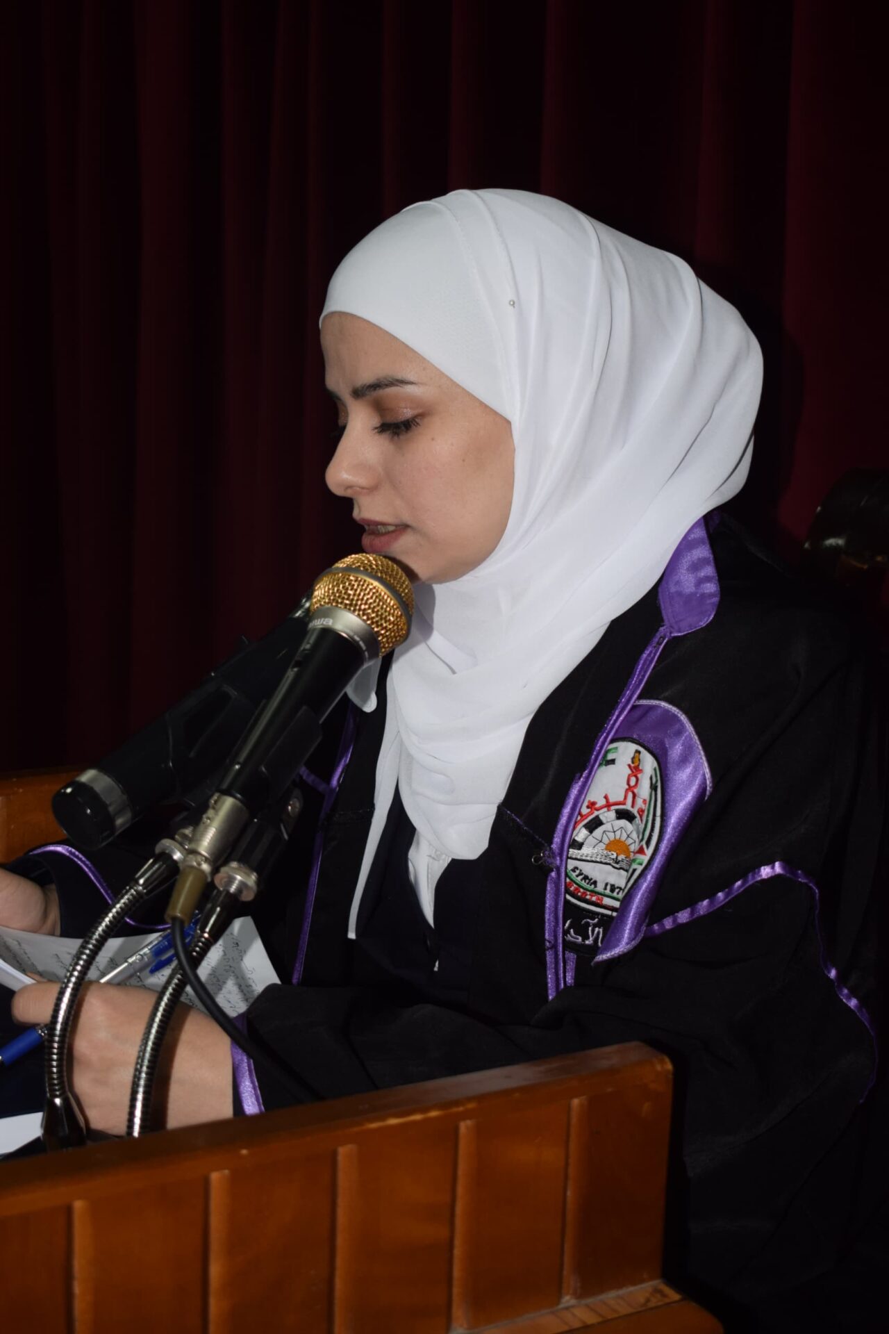 Awarding researcher Jihan Saad Bilal a master's degree in Arabic Language and Literature with ...