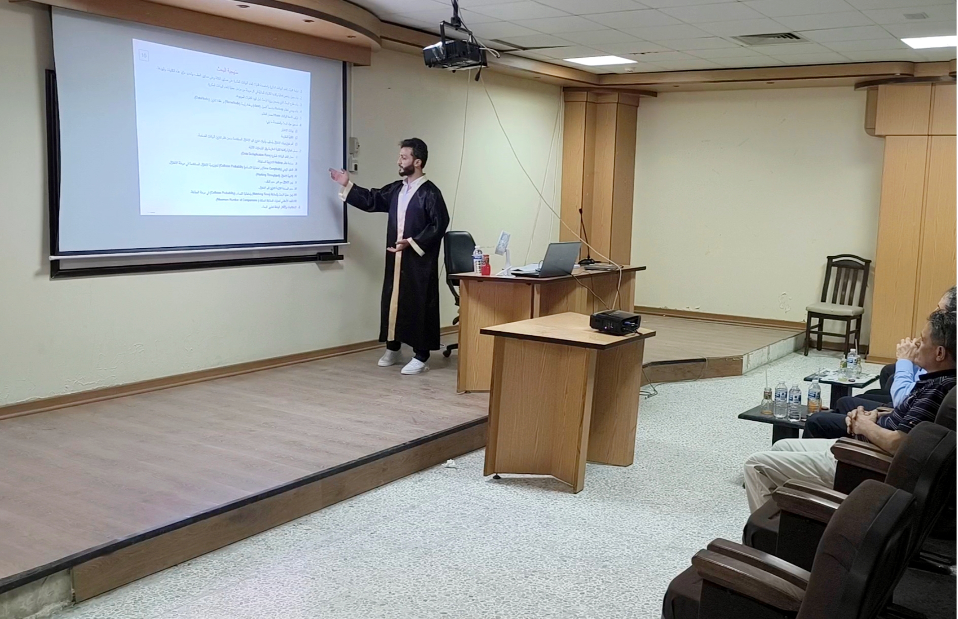Awarding researcher Hasan Hasan a doctorate degree in computer and ...