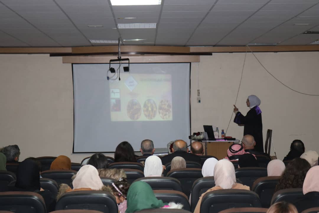 Awarding researcher Nisreen Waleed Al-Atrash a doctorate degree in ...